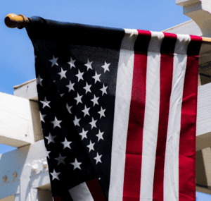 American Flag Hanging Vertically Meaning (& How To Do It Right)